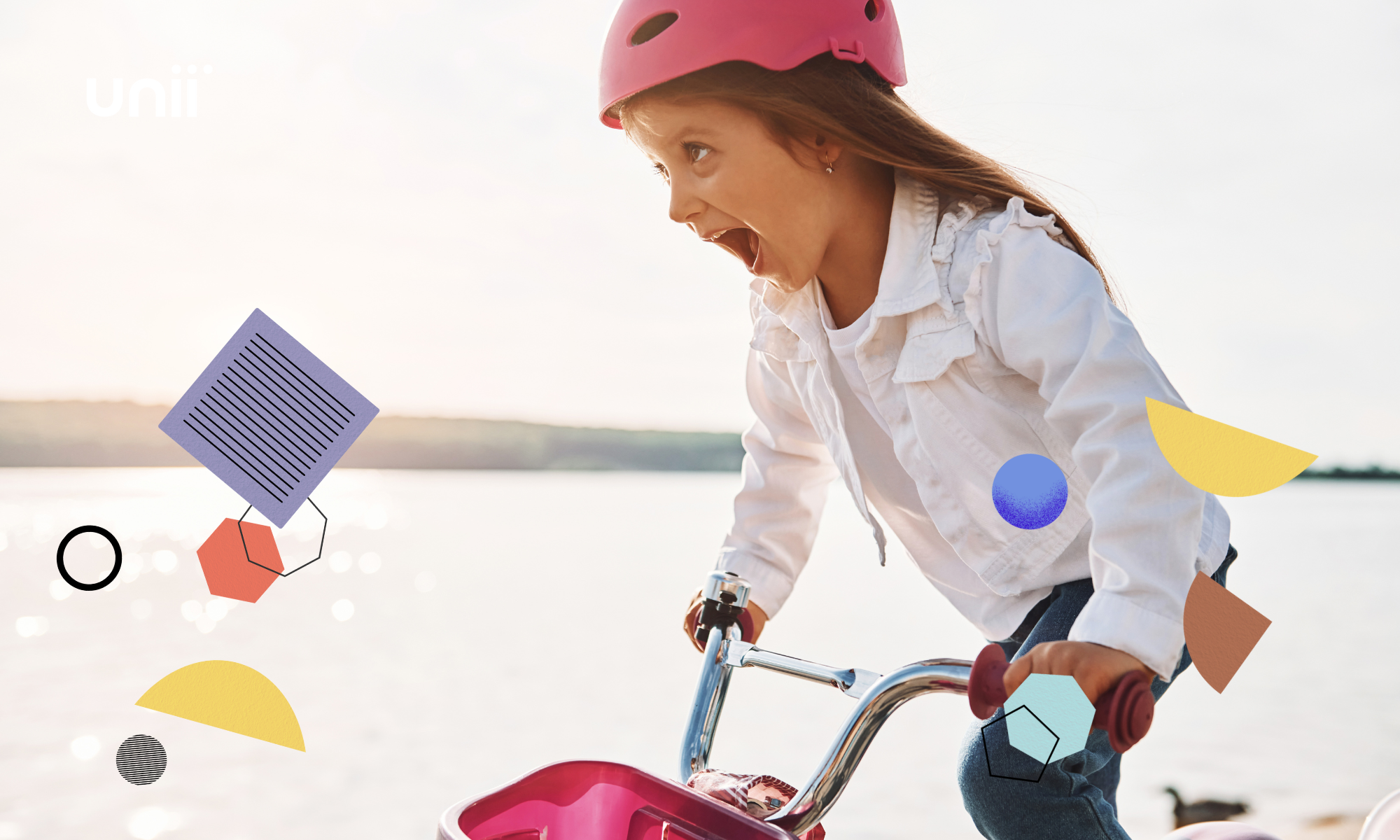 How do I teach my child to stand up while cycling?